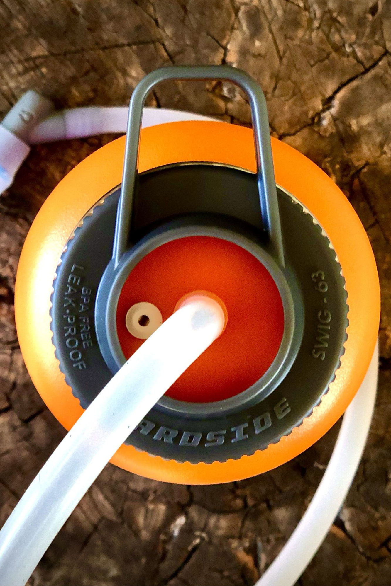 The Swig 63 Hydration Hose Adapter Cap - BIKEPACKING.com