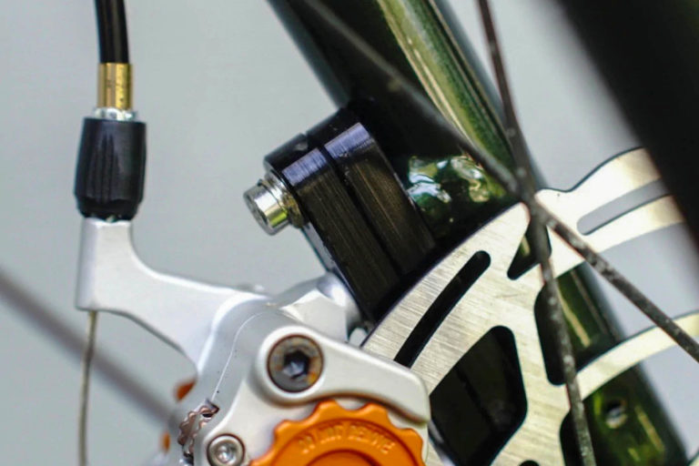 How to Fit 180mm Brake Rotors on Flat-Mount Frames/Forks - BIKEPACKING.com