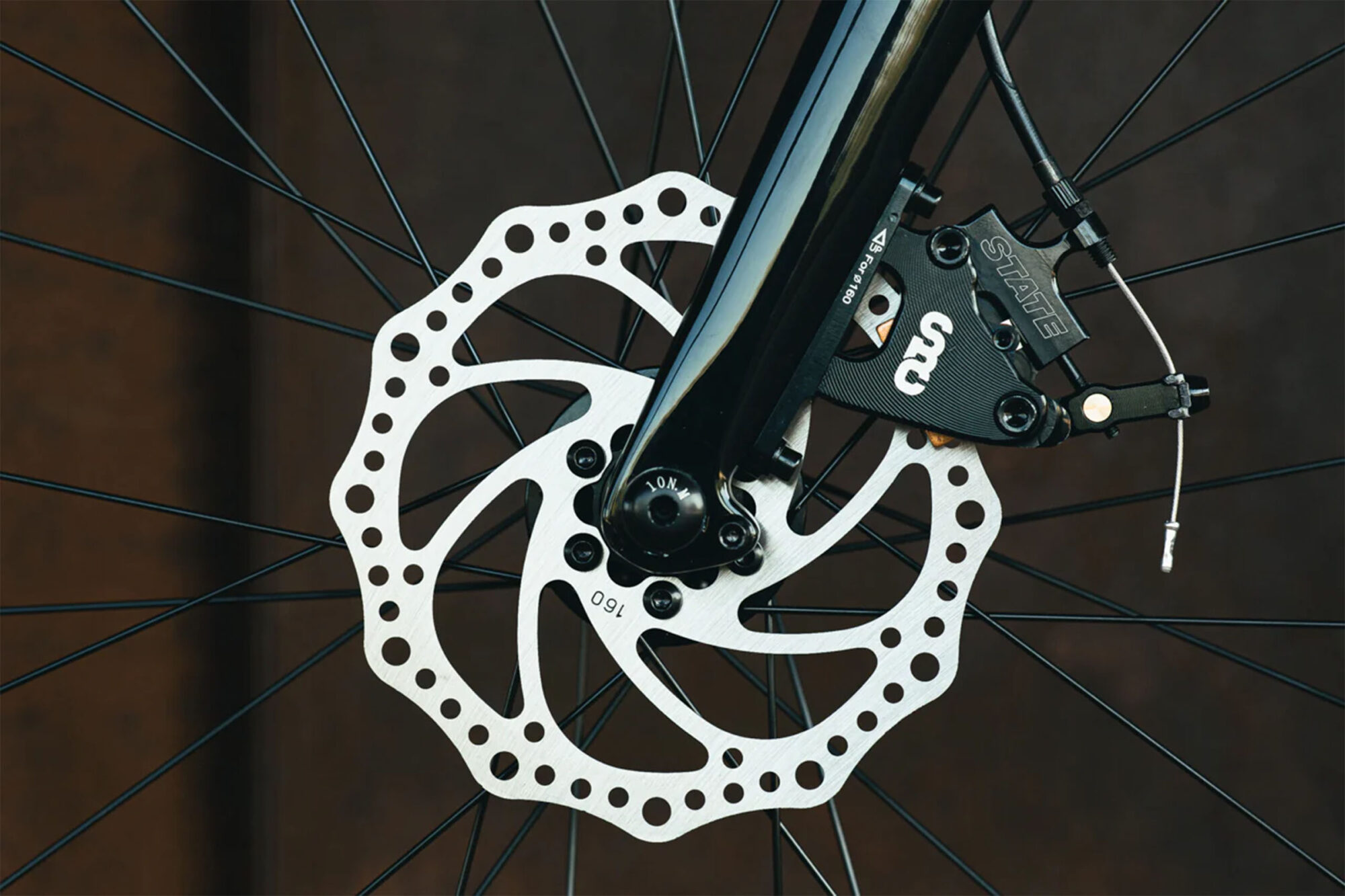 New State Bicycle Cargo Cage, Cable-Actuated Hydraulic Brakes, and More ...